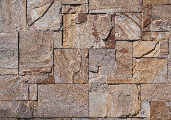 Natural Stone Wall Featuring a Variety of Textures and Colors in a ...