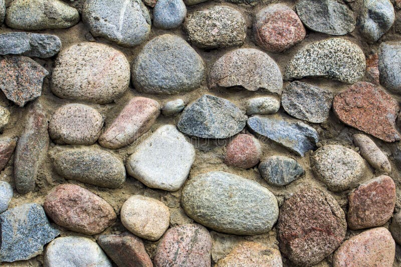 Natural Stone Wall of Round Stone, Front and Back Background Blurred ...