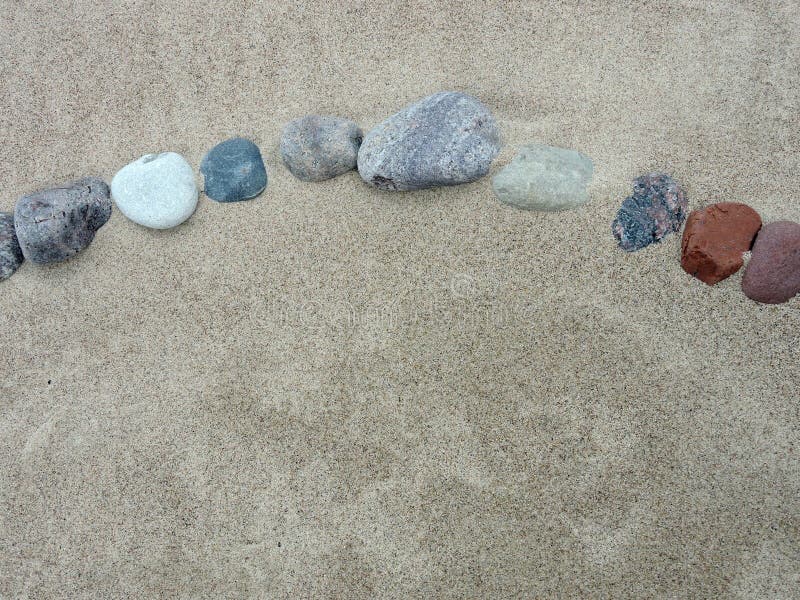 Natural stones on sand stock photo. Image of brown, natural - 87500924