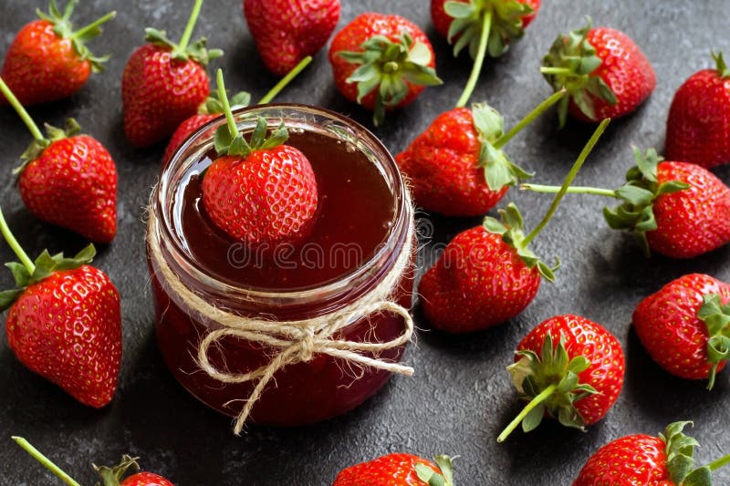 Natural Strawberry Jam with Ripe Strawberries on Black Surface Stock ...