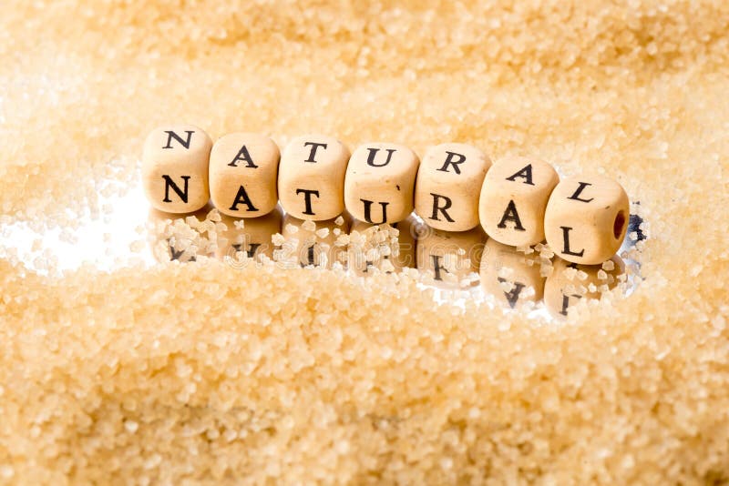 Natural Sugar - Wooden Blocks in Granules of Sugar on Mirror Background ...