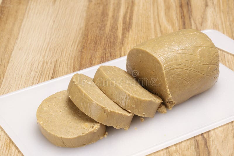 Natural, Tender, Sweet Halva Cut into Pieces on a Cutting Board Stock ...