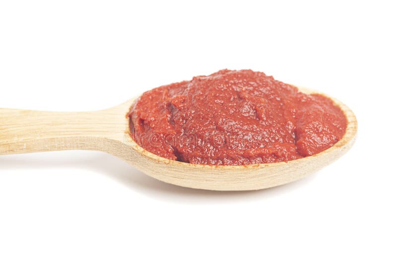 Natural Tomato Paste in Wooden Spoon Isolated on White Stock Image ...
