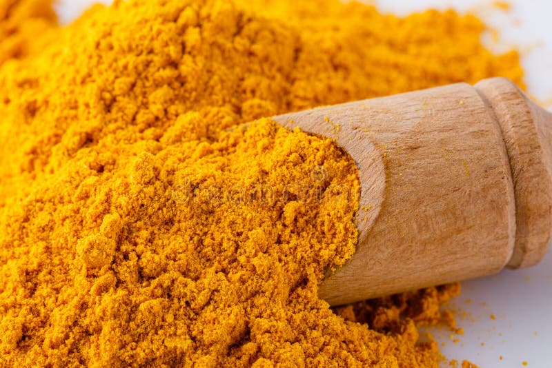 Natural Turmeric Oil in a Glass Bottle with Ground Turmeric Powder and ...