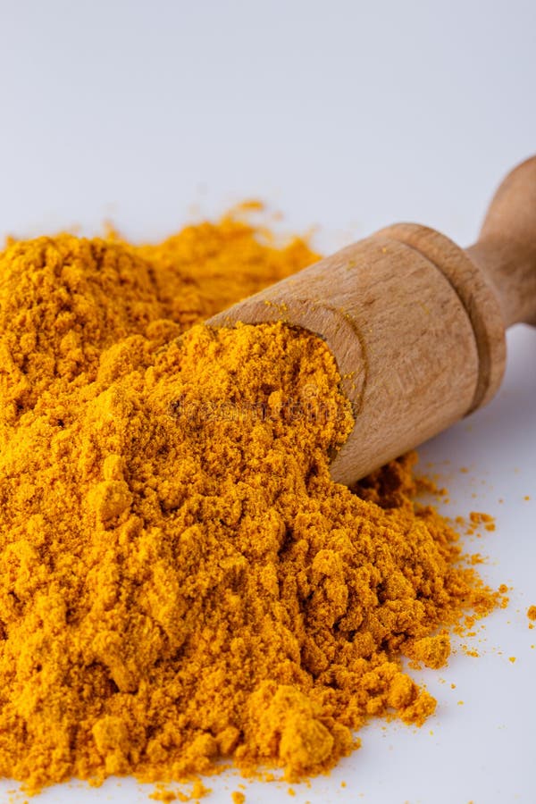 Natural Turmeric Oil in a Glass Bottle with Ground Turmeric Powder and ...