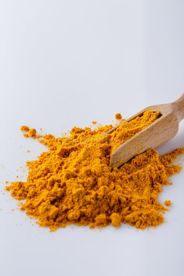 Natural Turmeric Oil in a Glass Bottle with Ground Turmeric Powder and ...