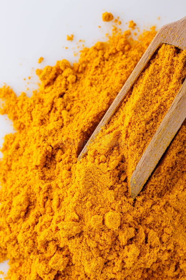 Natural Turmeric Oil in a Glass Bottle with Ground Turmeric Powder and ...