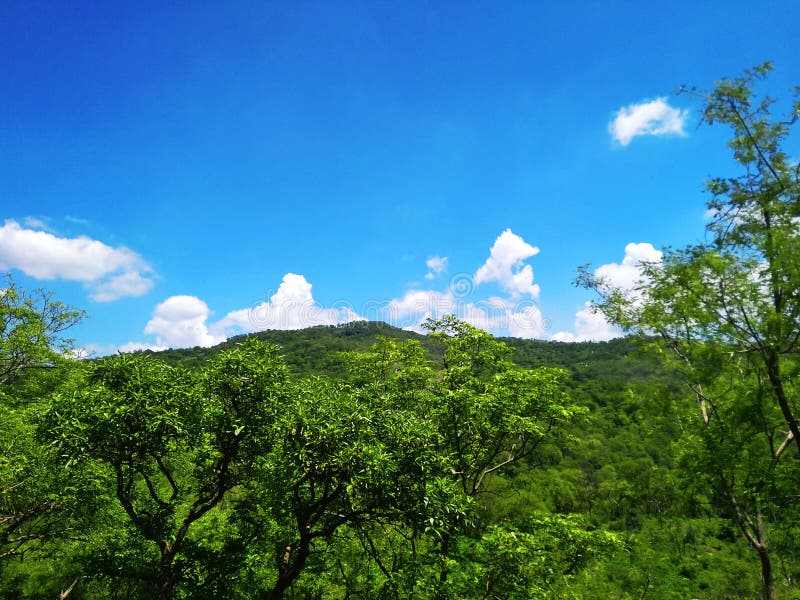 Natural View of Hill and Clouds Stock Photo - Image of hill, clouds ...