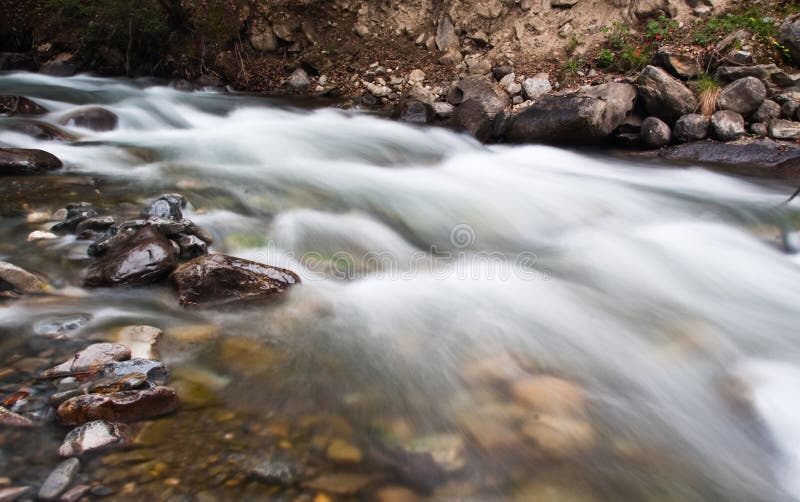 Rock in the river stock image. Image of moss, flow, rock - 13445985