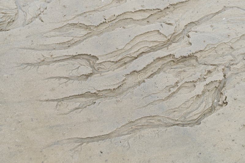 Natural Water Patterns in Wet Sand on a Beach, Showing Erosion and ...