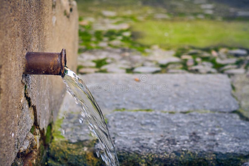Natural Water Source with a Single Water Pipe Stock Image - Image of ...