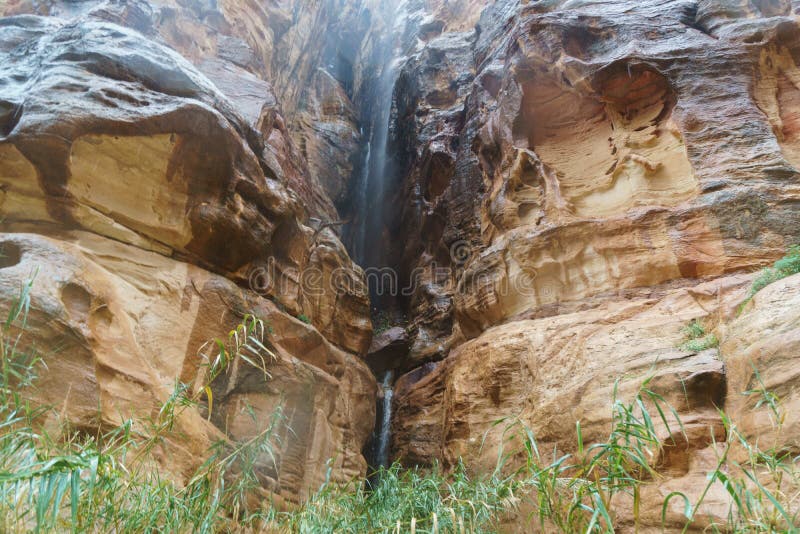 Natural Waterfall Falling from Rocks in Petra, Jordan Stock Photo ...
