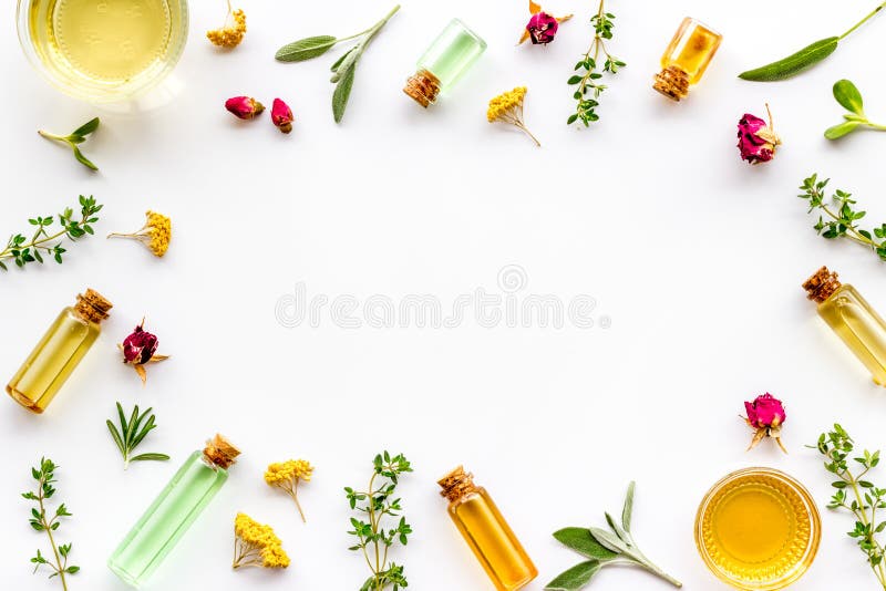 Natural Wellness. Essential Oils Near Herbs and Leaves on White ...