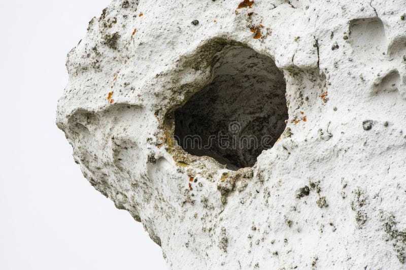 A Natural White Rock with a Circular Hole Drilled into Its Surface ...