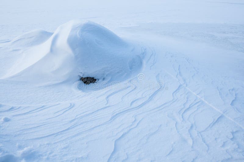 Wavy wind patterns in snow stock image. Image of season - 35284059