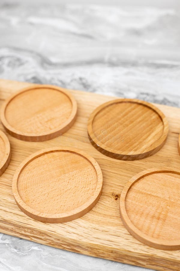 Natural Wooden Coasters on the Board Stock Image - Image of white ...