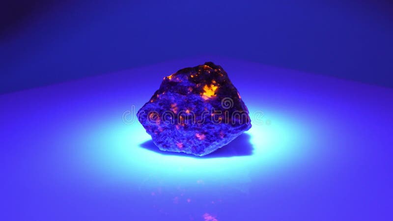Natural Yooperlite Under Uv Light on the Background Stock Video - Video ...