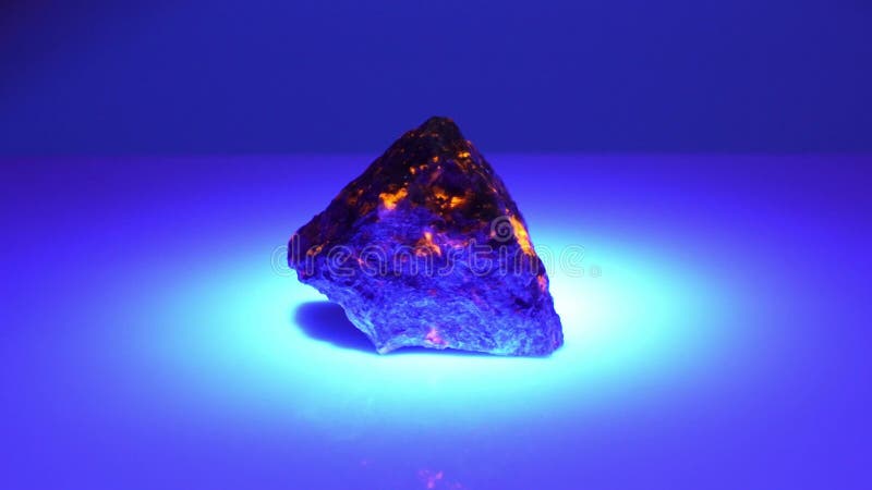 Natural Yooperlite Under Uv Light on the Background Stock Video - Video ...