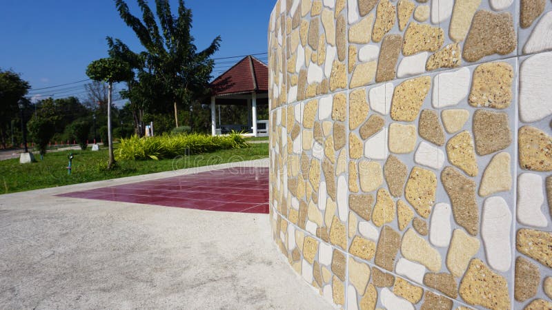 Naturally Beautiful Curved Stone Wall in the Park Stock Image - Image ...