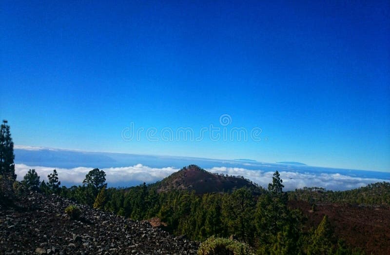 Nature above the clouds stock image. Image of alpine - 126360023