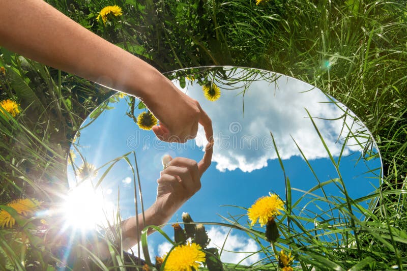 Hand Touching Sky Reflection in Mirror on Field Stock Photo - Image of ...