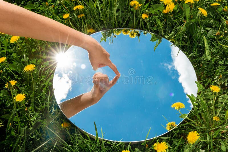 Hand Touching Sky Reflection in Mirror on Field Stock Image - Image of ...