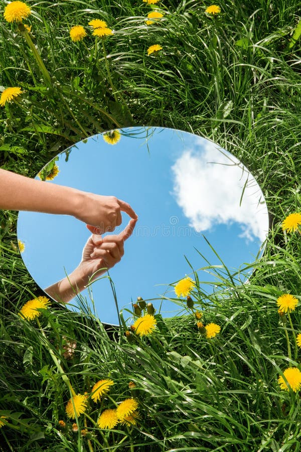 Hand Touching Sky Reflection in Mirror on Field Stock Image - Image of ...