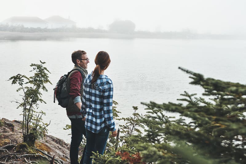 Nature is Full of Beautiful Things To Explore. a Young Couple Exploring ... Nature is Full of Beautiful Things To Explore. a Young Couple Exploring ...