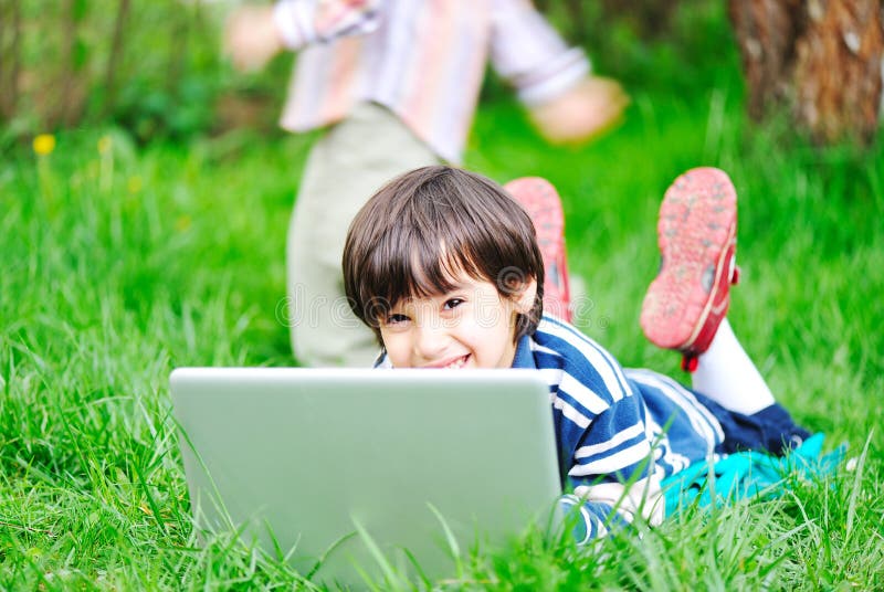Boy Smile with Tablet Outdoor Stock Photo - Image of people, holding ...