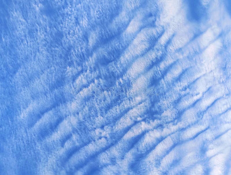 In Nature, this Phenomenon is Called "striped" Layered Cumulus Clouds ...
