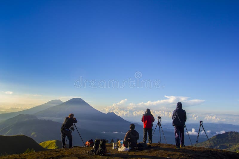 Nature Photographer in Action during Sunrise Editorial Photography ...
