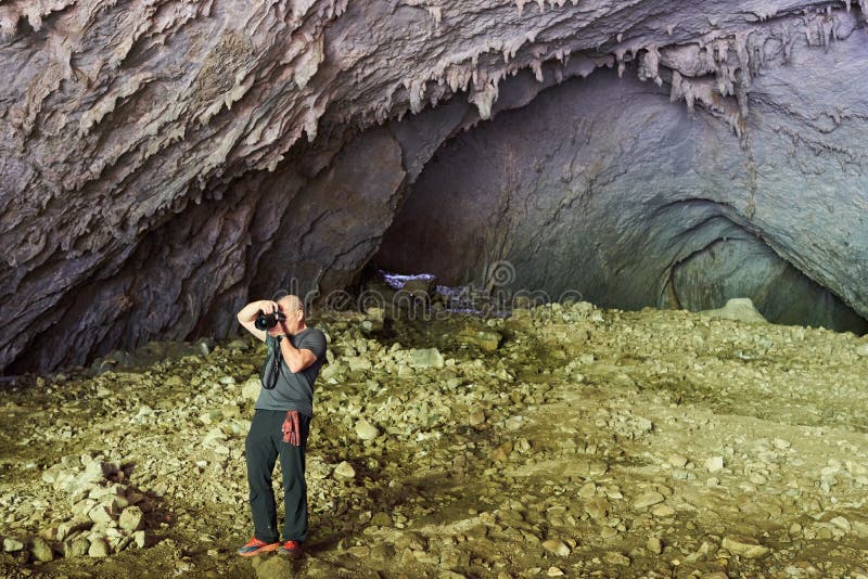 Nature Photographer Shooting in a Cave Stock Image - Image of ...