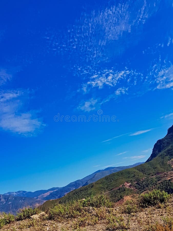 Nature Rugged Mountains Stretching Distance Under Clear Blue Sky Stock ...