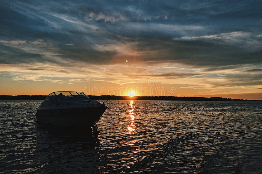 Nature sunset boat stock image. Image of romantic, clouds - 107025081