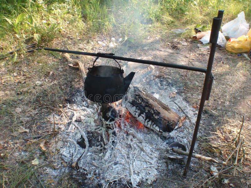In Nature, Tea is Boiling on an Open Fire Stock Photo - Image of black ...
