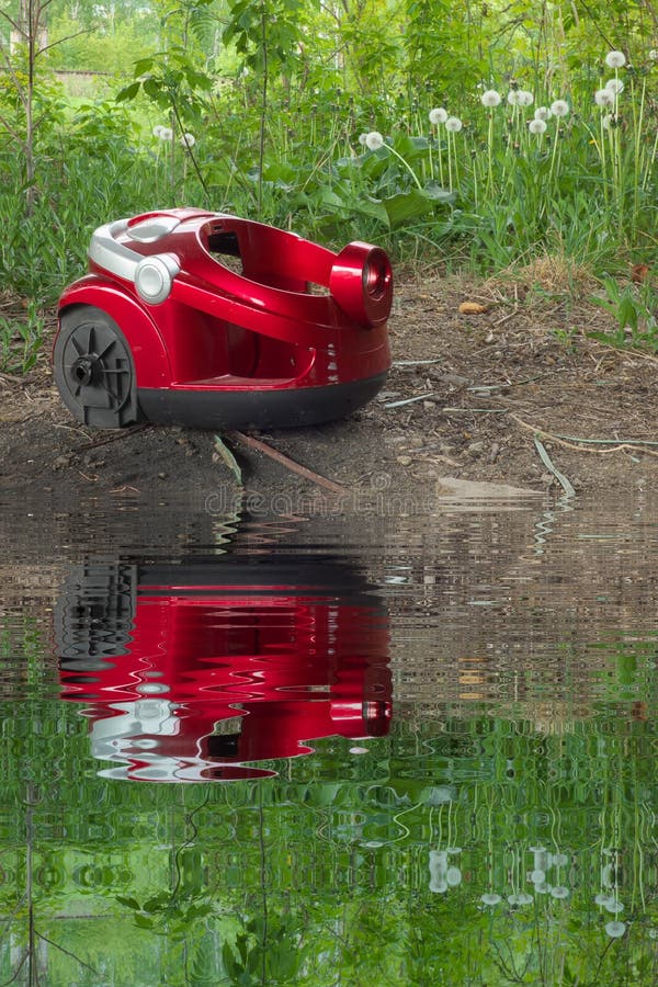 Nature Trash Vacuum Cleaner with Water Refections Stock Image - Image ...
