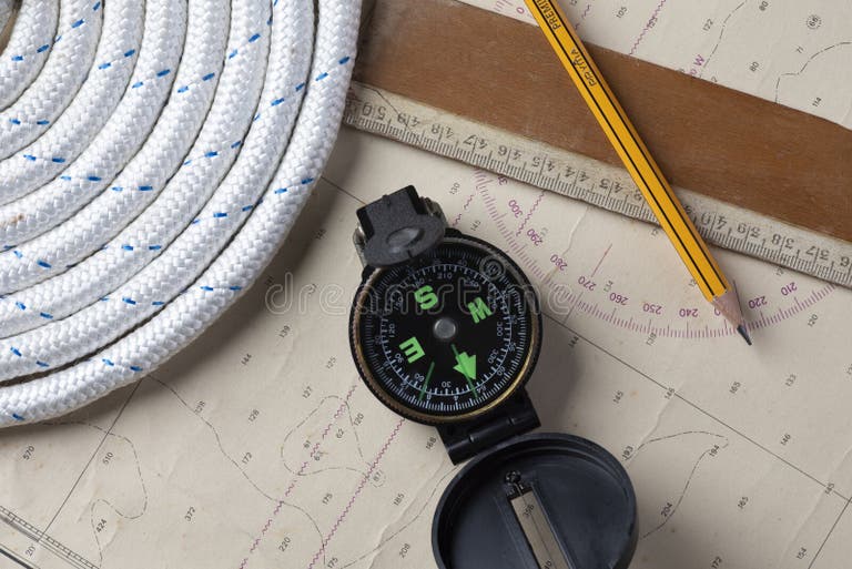 Nautical Chart with Ruler, Pencil and Compass and Rope Stock Image ...