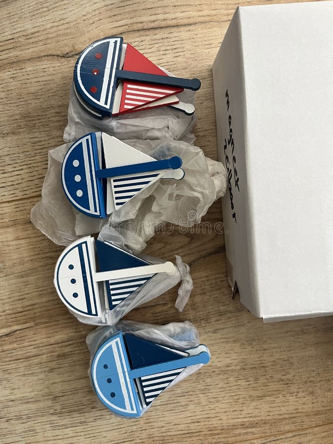 Nautical Magnets on Brown Tabel Stock Image - Image of sailing, stain ...