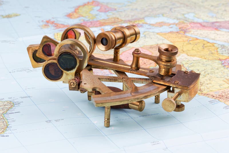 Nautical Sextant with Optics, Compass and Ruler Lying on Paper World ...