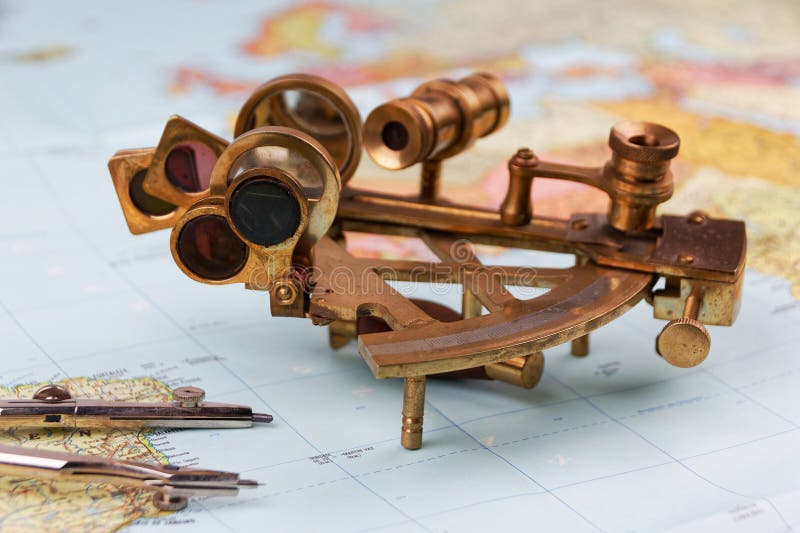 Nautical Sextant with Optics, Compass and Ruler Lying on Paper World ...