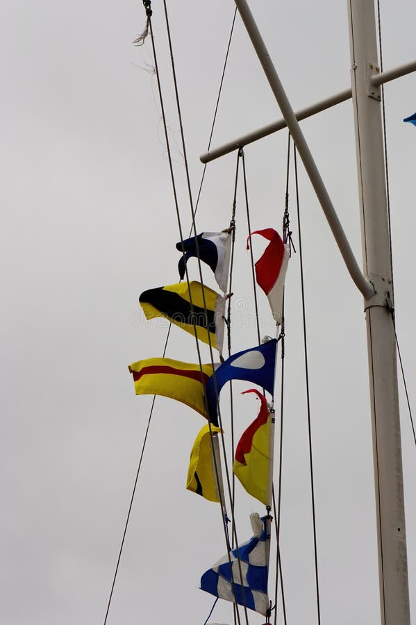 Nautical Signal Flags Flying from Flag Pole Stock Image - Image of ...