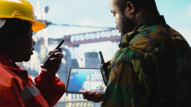 Naval Unit on Drilling Rig Barge Using Tablet, Safeguarding ...