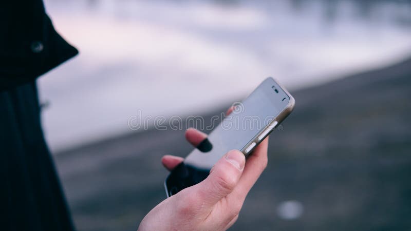 Navigating the City Using a Mobile Browser. Close-up of Hands of ...