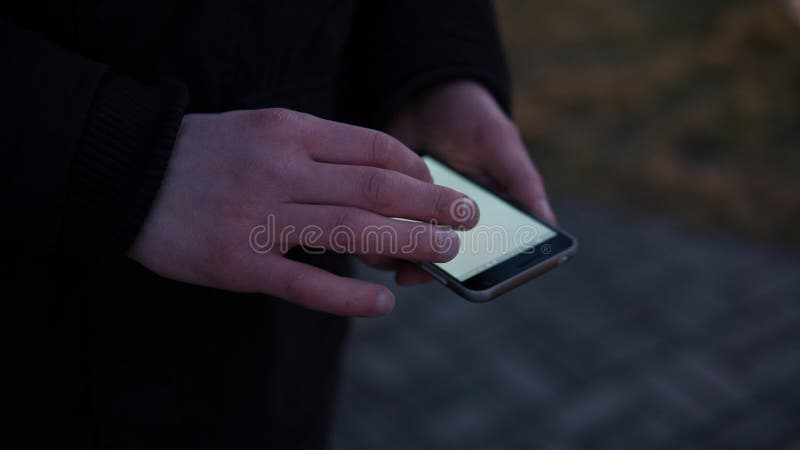 Navigating the City Using a Mobile Browser. Close-up of Hands of ...