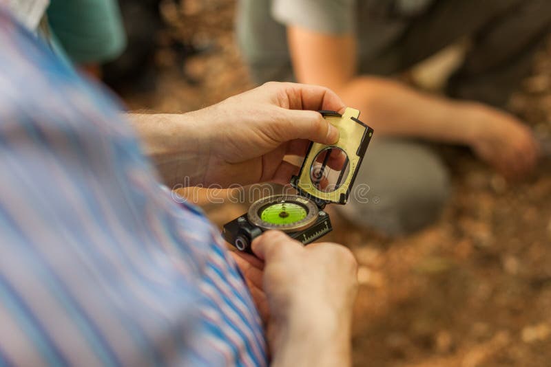 Navigating with compass stock image. Image of orientation - 16222429