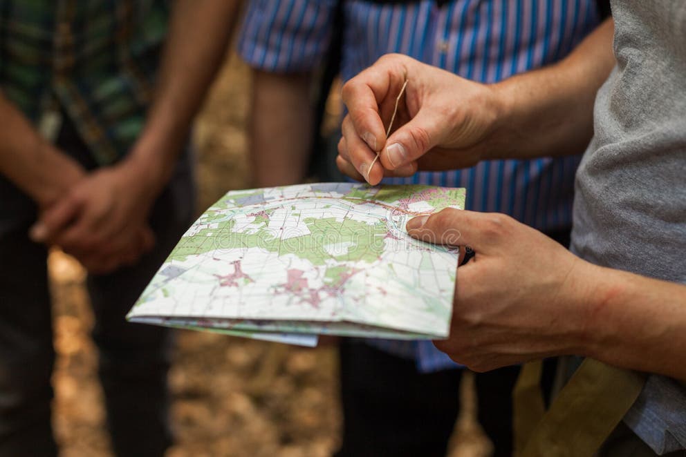 Navigating with Map and Compass Stock Image - Image of active, male ...