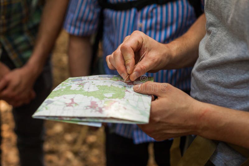 Navigating with Map and Compass Stock Image - Image of adult, daytime ...