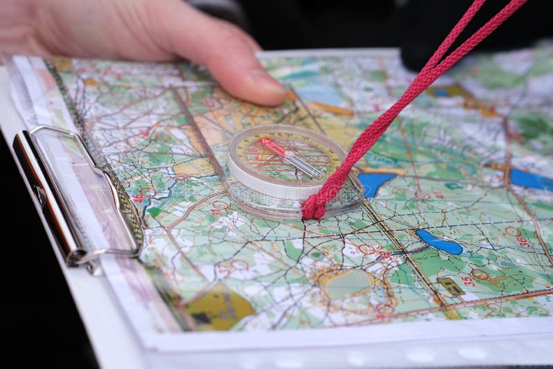 Navigating with Map and Compass Stock Photo - Image of activity ... Navigating with Map and Compass Stock Photo - Image of activity ...