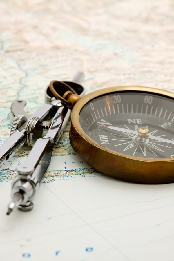 Compass on map stock image. Image of navigator, navigation - 595989