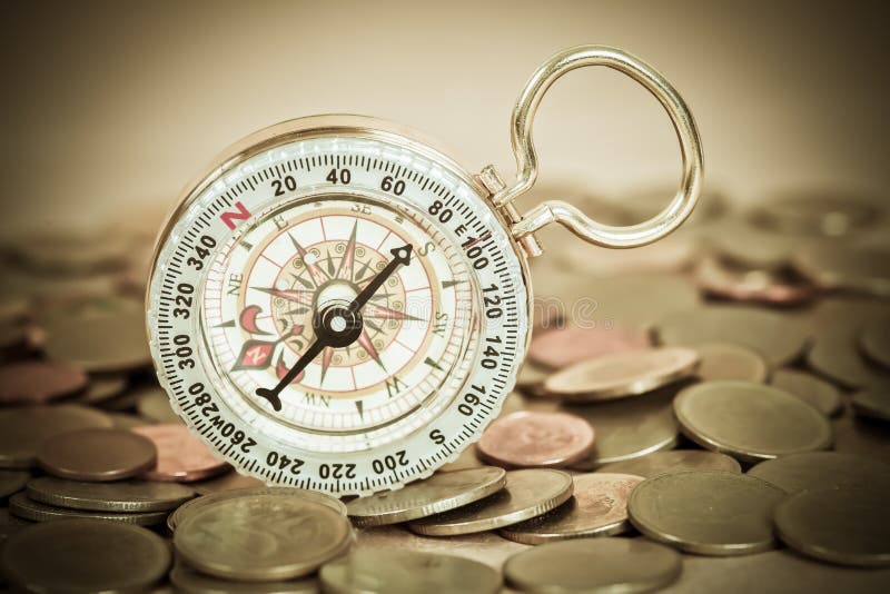Navigation Compass with Coins Money , Financial Stock Image - Image of ...